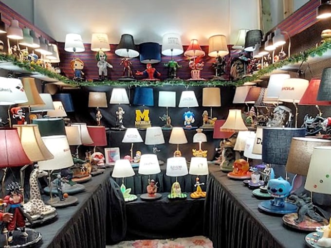 A gallery of character lamps stands at attention, where Michigan sports pride meets pop culture icons in illuminated form.