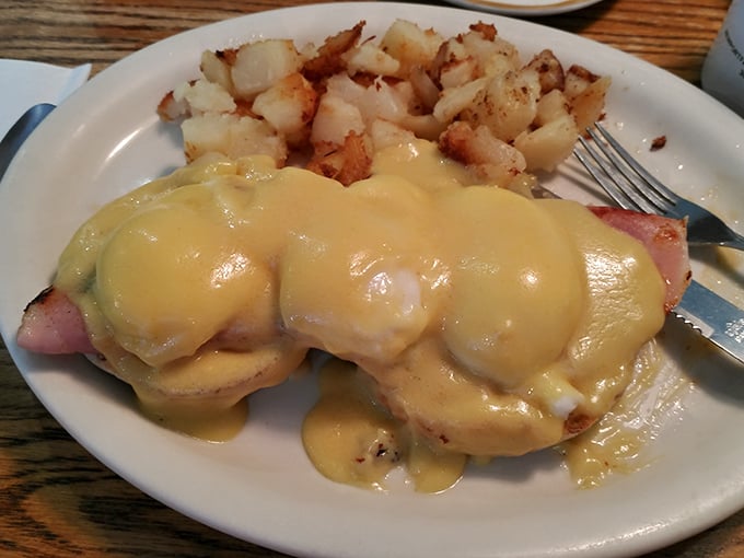 Eggs Benedict done right is like a good marriage—the hollandaise sauce and Canadian bacon in perfect harmony, no counseling needed.