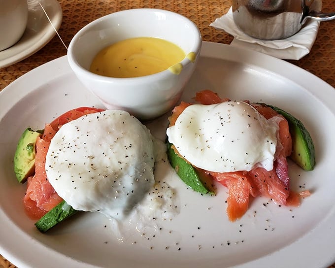 Eggs Benedict with salmon and avocado—proof that classics can evolve without losing their soul. That hollandaise is practically liquid sunshine.