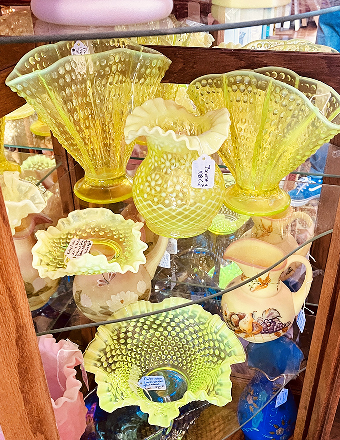 Sunshine captured in glass—these Fenton hobnail vases are what your grandmother's curio cabinet aspired to be in its most glamorous dreams.