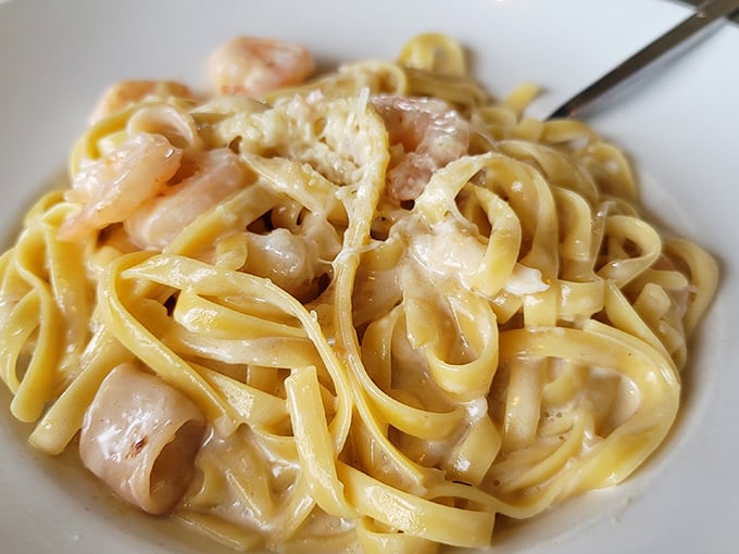 Fettuccine that's unapologetically rich and silky, dotted with plump shrimp—comfort food that hugs you from the inside out.