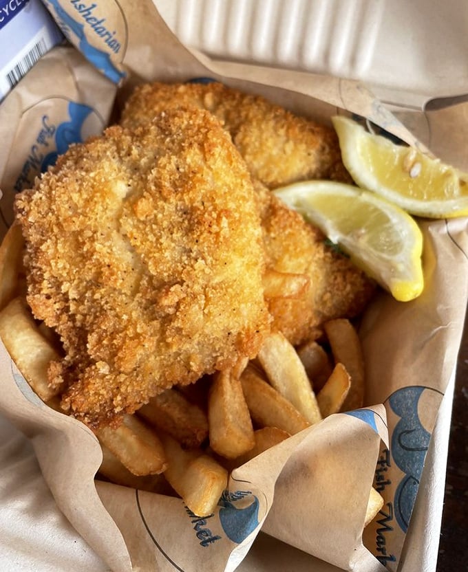 Golden-battered fish and chips that shatter with each bite – the kind that makes you wonder why you ever settled for lesser versions all these years.