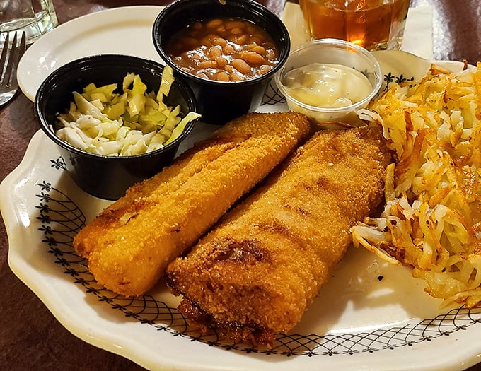 Golden-fried fish that would make any Friday in Wisconsin jealous. The hash browns aren't a side dish—they're an essential supporting character.