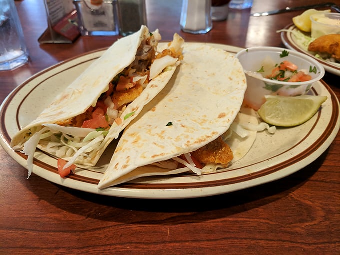 Fish tacos done right—simple, fresh, and uncluttered. The lime wedge isn't a suggestion; it's the key that unlocks the flavor vault.