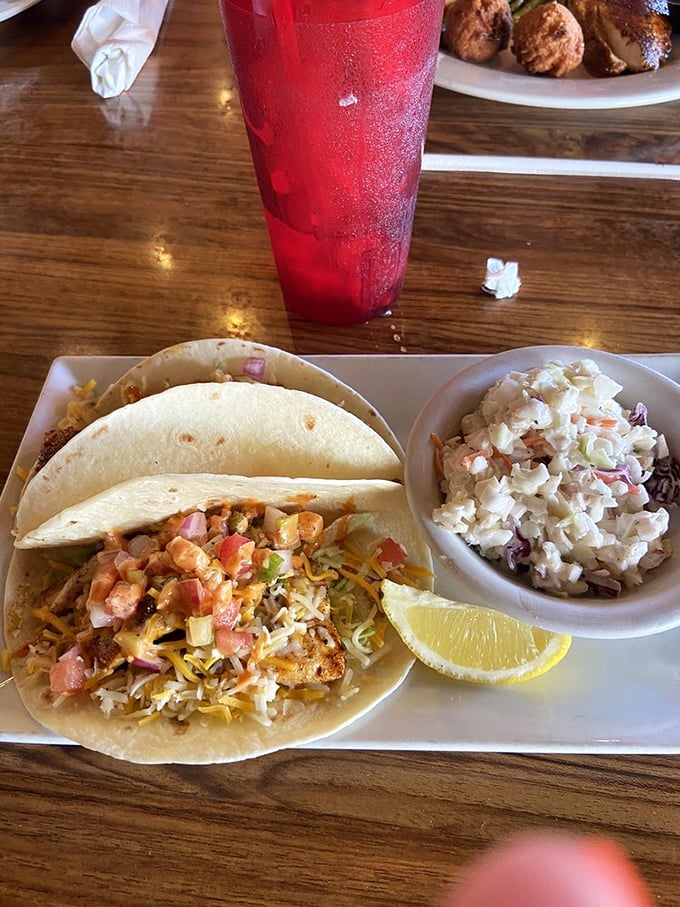 Fish tacos that make you question why you ever ate anything else, paired with coleslaw that might make you forget your grandmother's recipe.