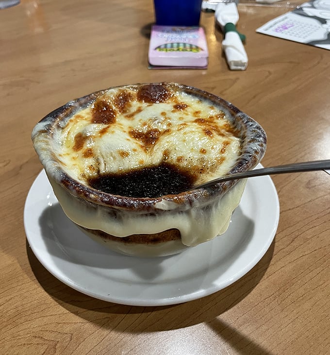 French onion soup so good it should have its own passport—that cheese pull could win Olympic medals for both distance and form.