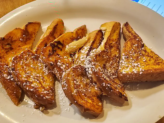 French toast dusted with powdered sugar—the kind of simple pleasure that makes you question why anyone needs molecular gastronomy.