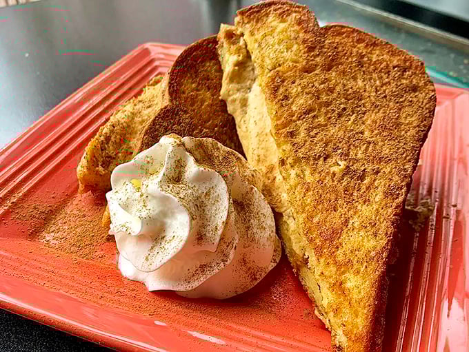 Golden French toast with whipped cream demonstrates that starting your day with something sweet isn't just acceptable, it's practically mandatory here.