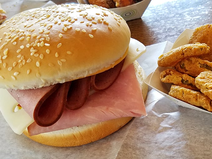 Sometimes the best sandwich is the simplest: fried bologna on a sesame bun, gloriously unapologetic about its humble origins.
