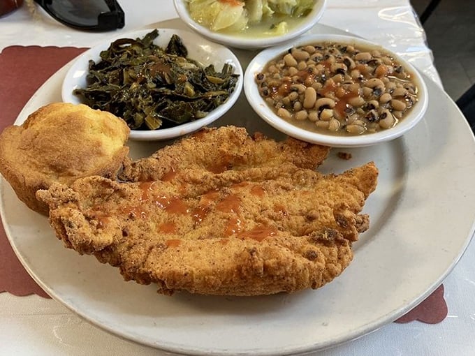Crispy catfish that makes you question every other fried fish you've ever eaten. Paired with collards and black-eyed peas – the holy trinity.