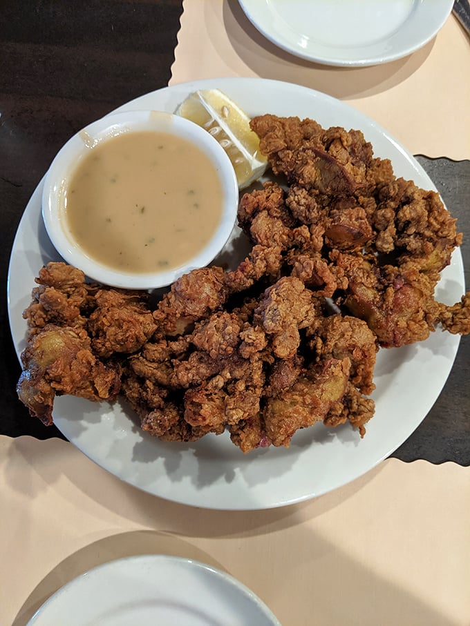 Crispy fried chicken livers—that delicacy your grandparents raved about—prove the old-timers were right all along. Dip them in that creamy sauce for maximum effect.