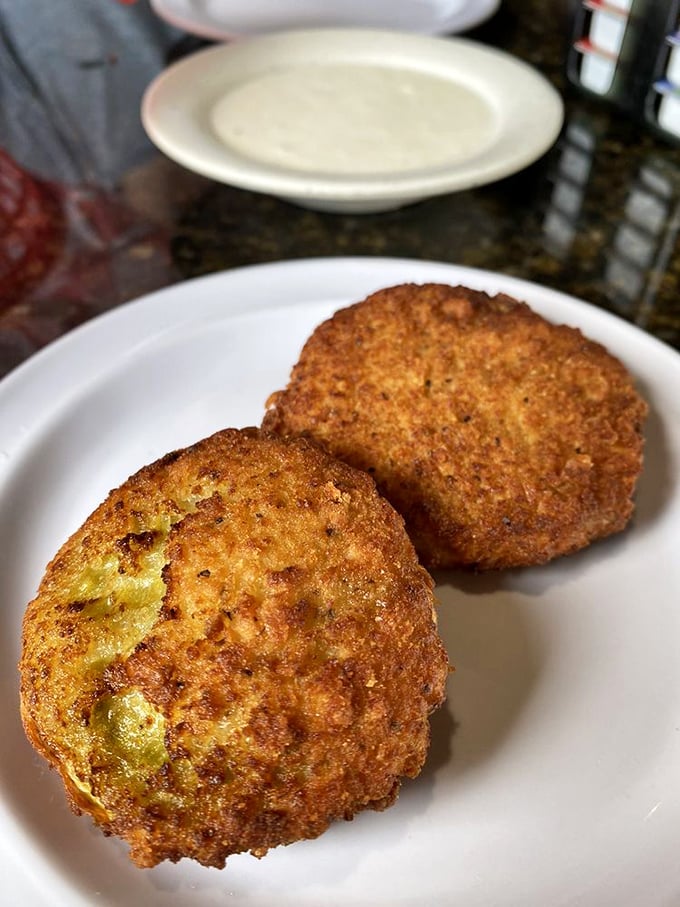 Golden-fried perfection that makes you wonder why more vegetables don't get the crispy treatment—these fried green tomatoes demand attention.