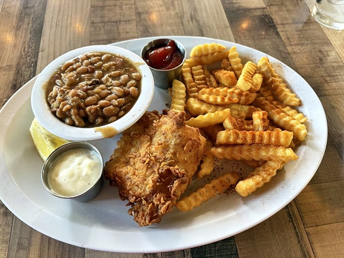 Crispy on the outside, flaky perfection inside – this fried fish plate with beans and fries is comfort food that would make a Bostonian homesick.
