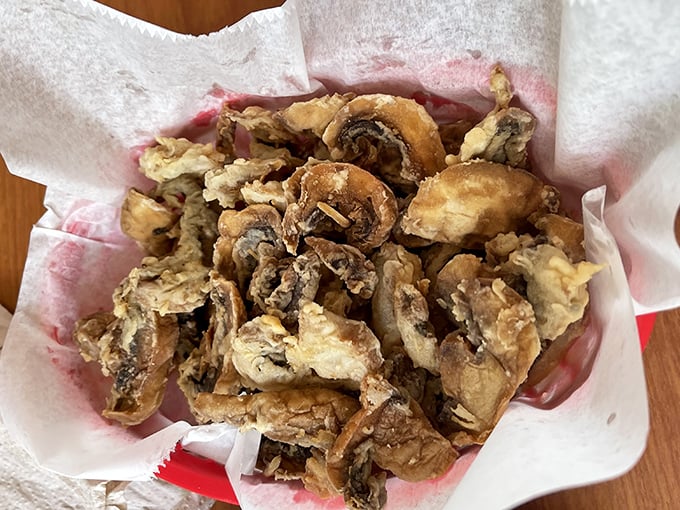 Golden-fried mushrooms that crunch like nature's popcorn—the perfect opening act before the meaty main event steals the show.