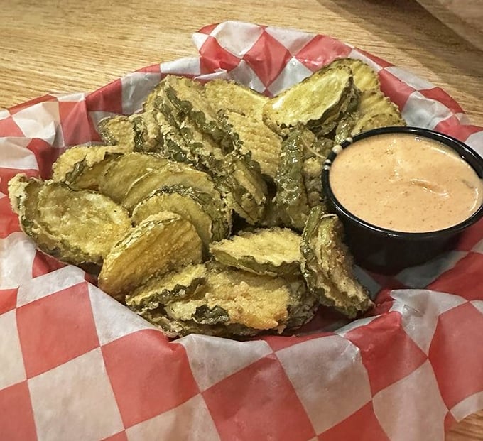 These aren't your average pickle chips. Crispy, tangy, and utterly addictive when dunked in that house-made Cajun remoulade – resistance is futile.