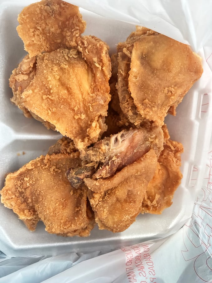 Golden-fried chicken that makes you understand why people write songs about Southern cooking—crispy, juicy, and worth every napkin you'll need.