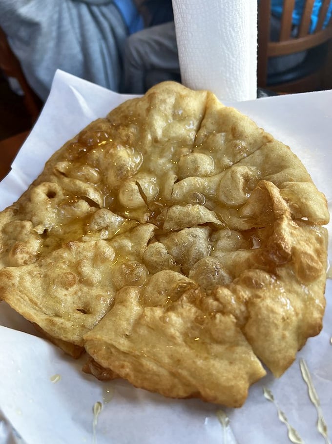 Honey glistens on freshly made fry bread like morning dew on desert flowers—simple perfection that needs no further embellishment.