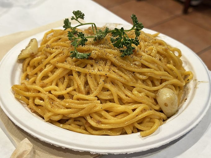 Garlic noodles that glisten with buttery goodness, topped with fresh parsley – the perfect supporting actor to your seafood star.