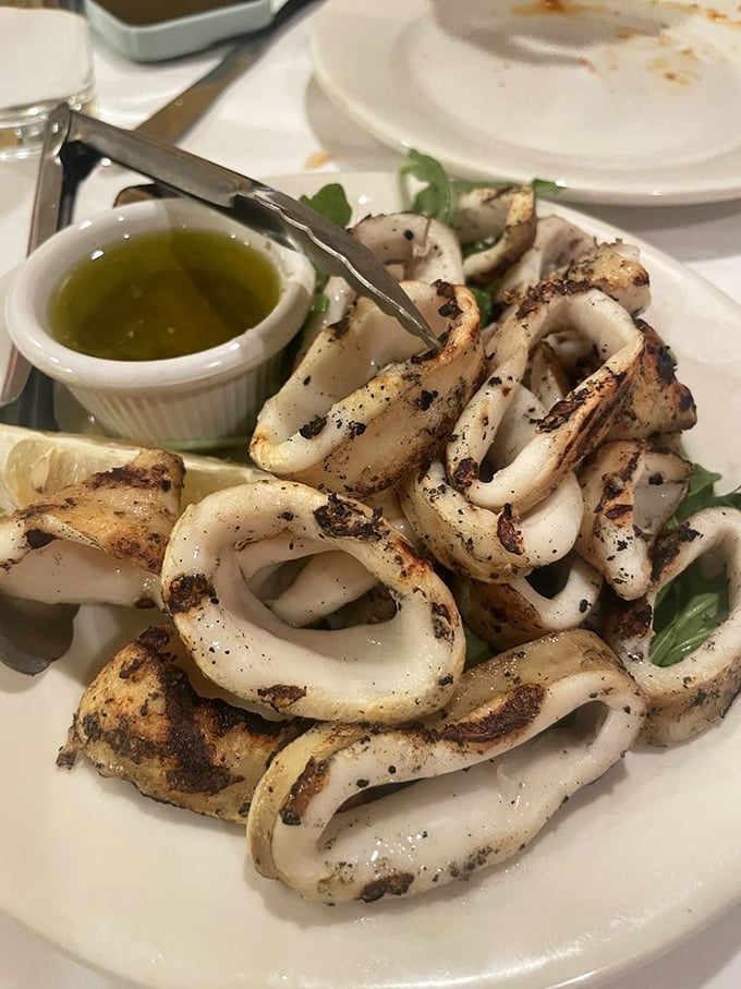 Grilled calamari that respects the squid enough not to hide it under breading. A squeeze of lemon, herbs, olive oil – sometimes simplicity is the ultimate sophistication.