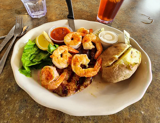 Shrimp, steak, and a baked potato walk into a diner—sounds like the setup for heaven on a plate.