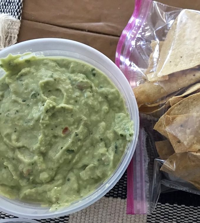 This guacamole has achieved the perfect texture—chunky yet smooth, like the jazz playlist at your coolest friend's dinner party.