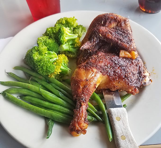 This isn't just chicken, it's poultry poetry – herb-crusted, perfectly roasted, and served with vegetables that didn't come from a freezer bag.