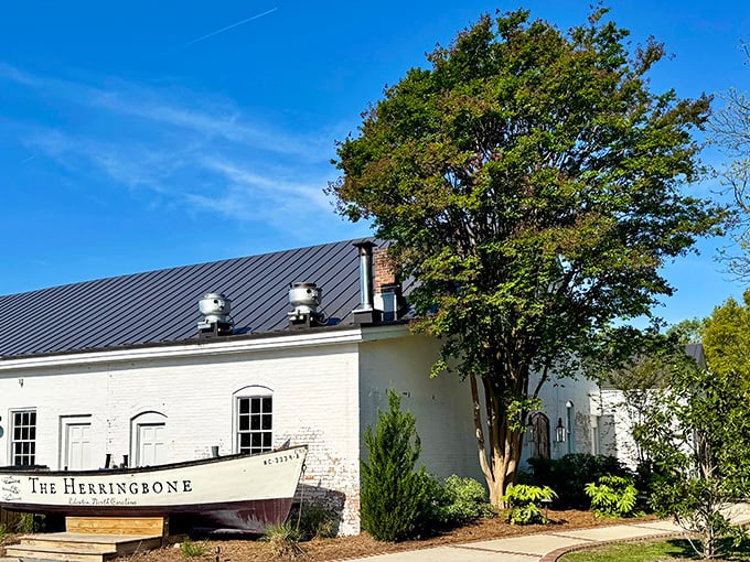The Herringbone's weathered boat out front isn't false advertising—it's a promise that seafood doesn't get fresher than this corner of North Carolina.