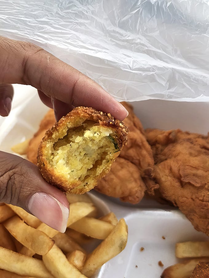 The humble hush puppy—crispy exterior, fluffy cornmeal interior—the supporting actor that sometimes steals the scene from the seafood stars.