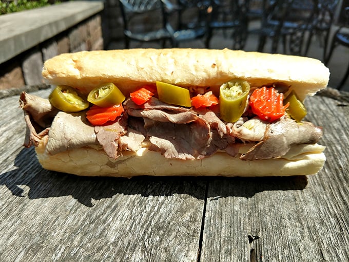 The Italian beef sandwich comes loaded with thinly sliced meat, giardiniera, and sweet peppers – Chicago's iconic handheld masterpiece ready for its close-up.