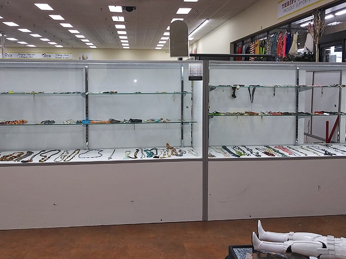 Jewelry cases gleam under fluorescent lights, their half-empty shelves suggesting today's early birds already caught the sparkliest worms.