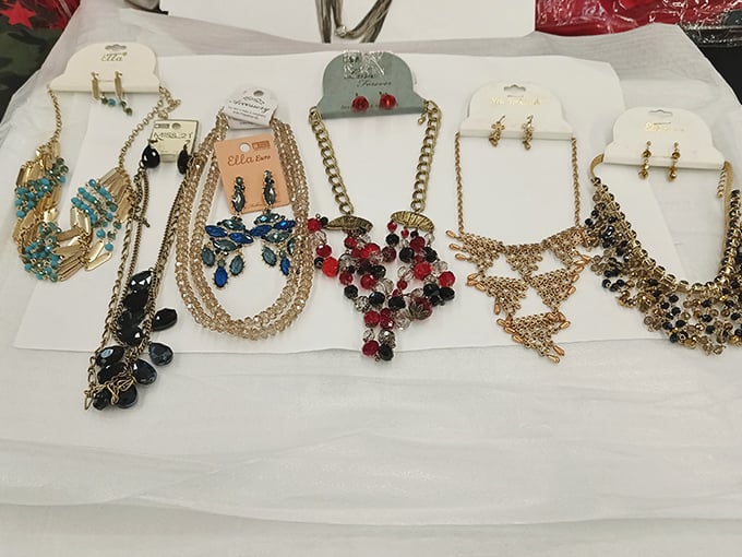 Jewelry displayed with hopeful elegance, each necklace telling a different story—like a casting call for accessories hoping to make it big.