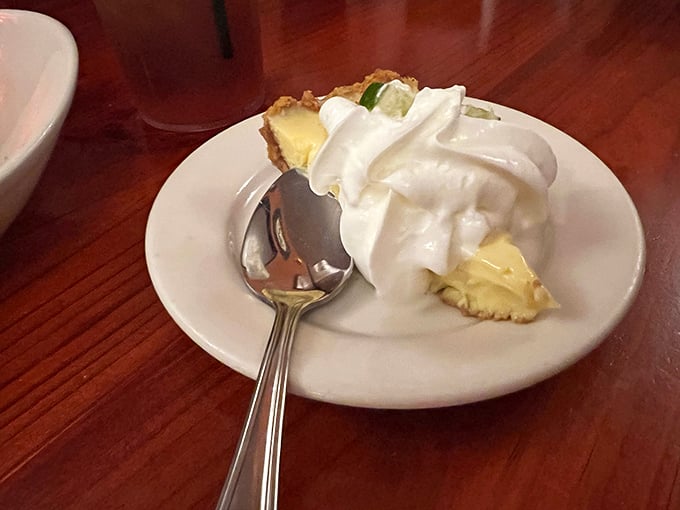 Key Lime Pie—Florida's signature dessert done right. That cloud of whipped cream atop tangy custard is the perfect finale to a hearty meal.
