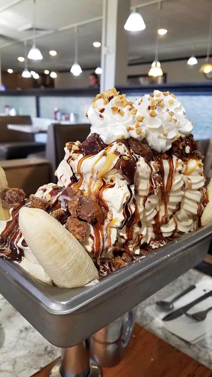 This isn't just dessert—it's a banana split that had ambitions, went to graduate school, and came back to show the hometown what success looks like.