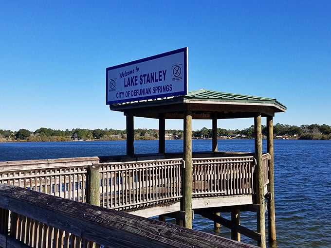 Lake Stanley's wooden pier invites visitors to contemplate life's big questions, like "Why don't more Florida lakes have views this peaceful?"