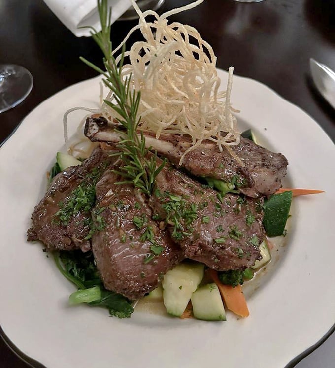 Lamb chops that make you question every other lamb chop you've ever eaten. That crispy herb garnish isn't just pretty—it's a flavor exclamation point.