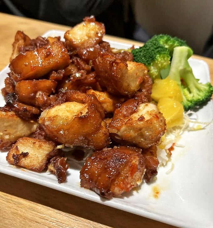 This isn't just chicken—it's a masterclass in caramelization. Even the broccoli looks like it's having the time of its life.