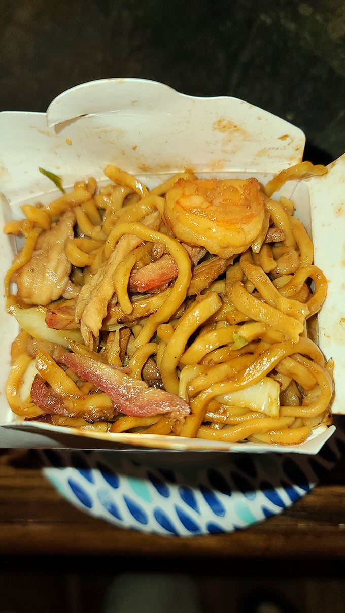 Lo mein noodles intertwine with savory morsels of meat and vegetables—a delicious tangle that's worth getting yourself into.