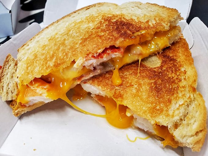 The lobster grilled cheese—where comfort food meets luxury. Like your childhood favorite got a promotion and moved to the coast.