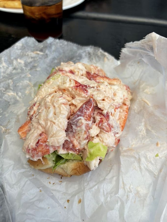 This lobster roll isn't just a sandwich—it's a celebration of summer in New England, with chunks of lobster meat practically high-fiving your taste buds.