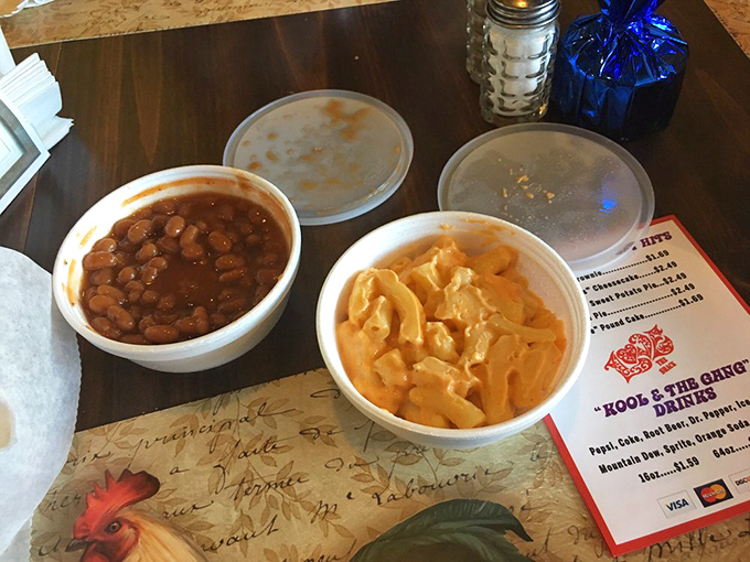 Baked beans and mac and cheese—the supporting actors that deserve their own standing ovation. Comfort in every creamy, savory spoonful.