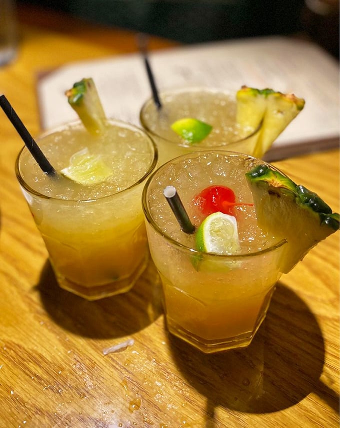 These Mai Tais don't whisper "vacation"—they shout it from the rooftops. One sip and you'll swear you hear ukuleles playing in the distance.