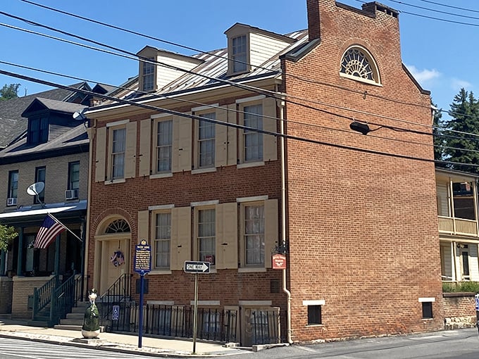 The McCoy House stands as proudly as your grandfather at Thanksgiving dinner, brick facade telling tales of Pennsylvania's storied past.