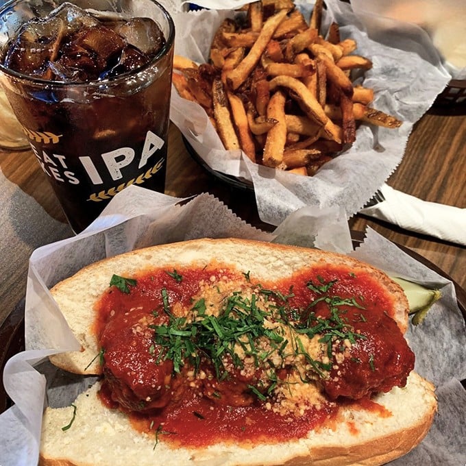 This meatball sandwich isn't messing around – hearty, saucy, and demanding your full attention. The parsley isn't decoration; it's a palate cleanser.