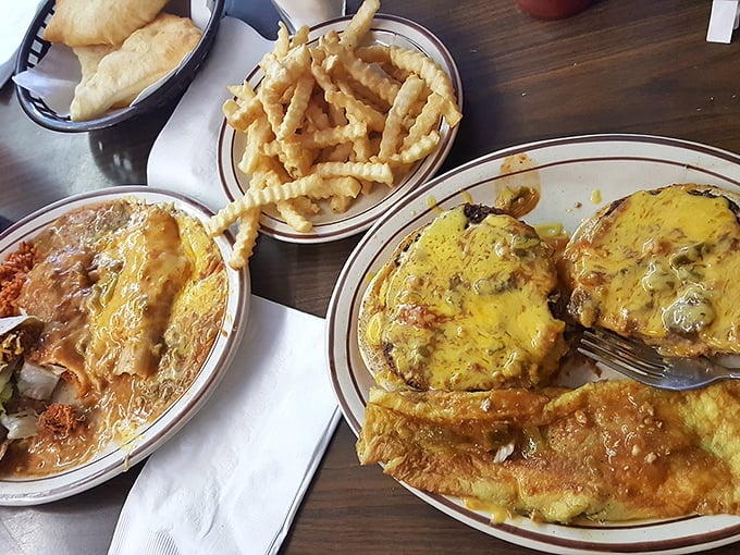 A plate loaded with enchiladas, rice, beans, and a taco proves that Jerry's takes "generous portions" as a sacred responsibility.