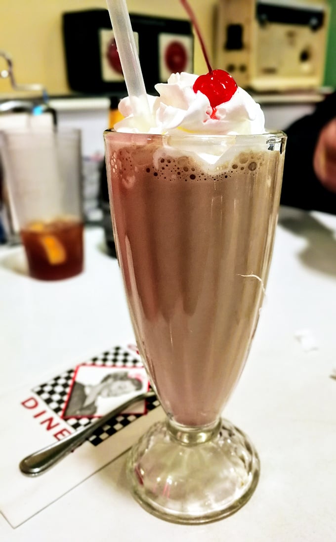 This milkshake doesn't just bring boys to the yard—it brings everyone to Lori's, topped with whipped cream and a cherry that's basically mandatory.