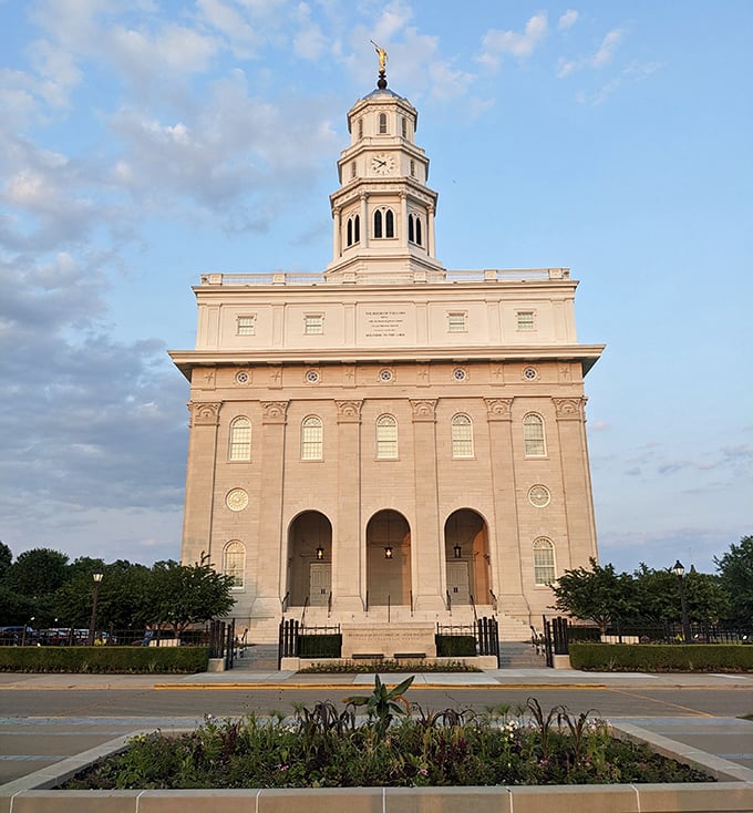 The temple's limestone facade catches the light like it's posing for its close-up, and honestly, it's earned it.