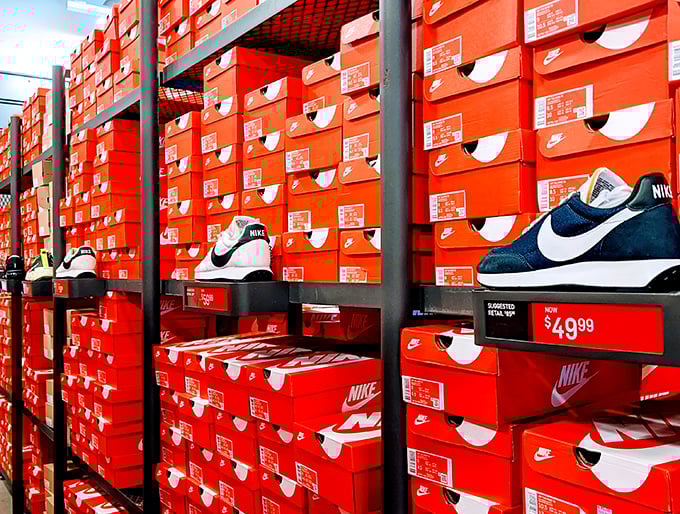 The wall of Nike boxes resembles the world's most organized sneakerhead's dream closet. That $49.99 tag is the real MVP.