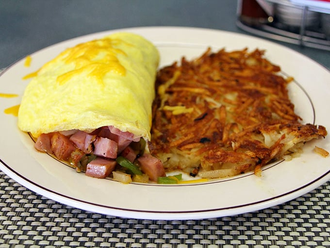 This ham and veggie omelet with crispy hash browns is breakfast architecture at its finest—precisely engineered for maximum morning happiness.