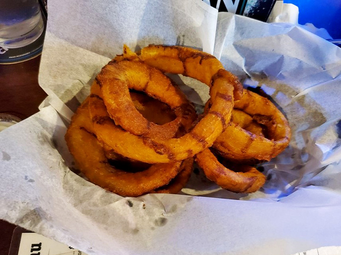 These onion rings aren't just appetizers, they're golden halos of crispy perfection. Forget jewelry – these are the only rings worth showing off.
