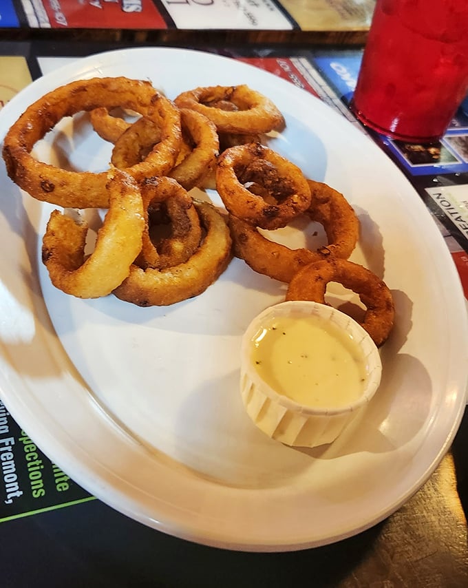 These aren't just onion rings—they're crispy, beer-battered halos that make you question why you'd ever eat onions any other way.